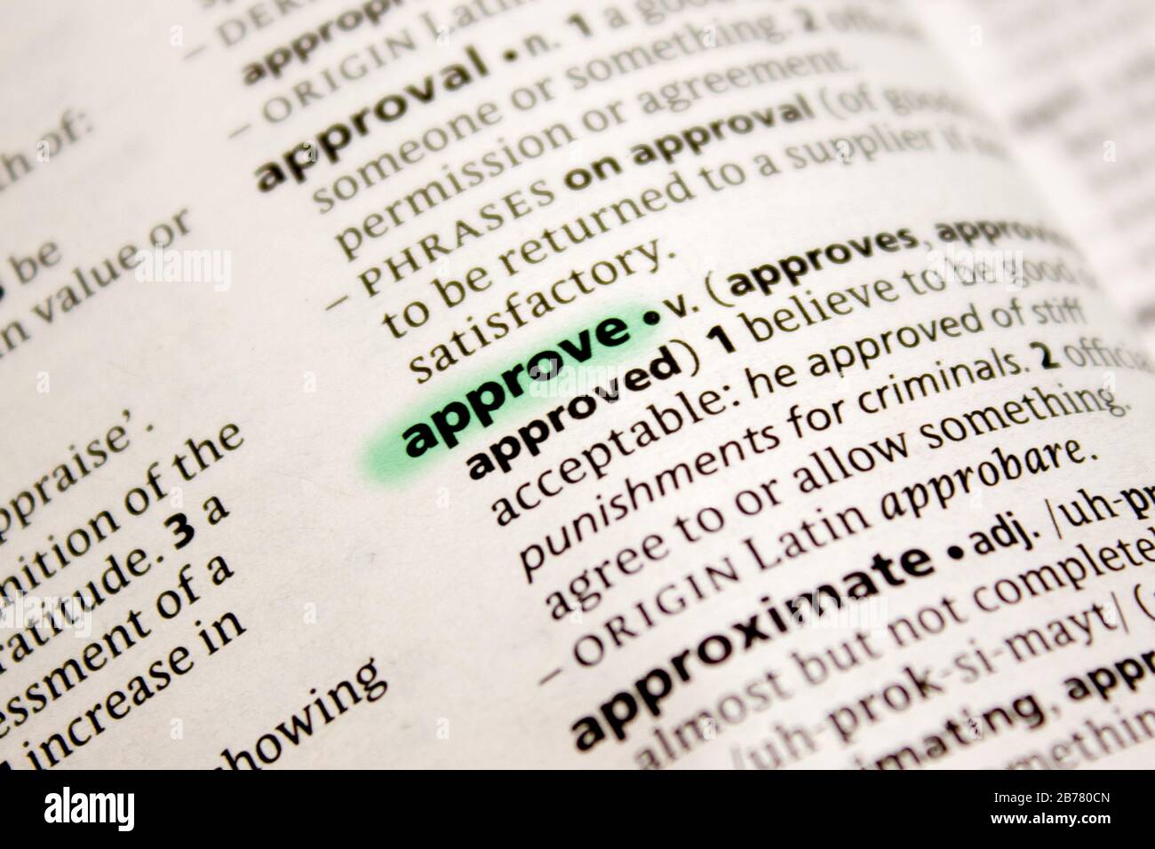 Approve word or phrase in a dictionary Stock Photo - Alamy