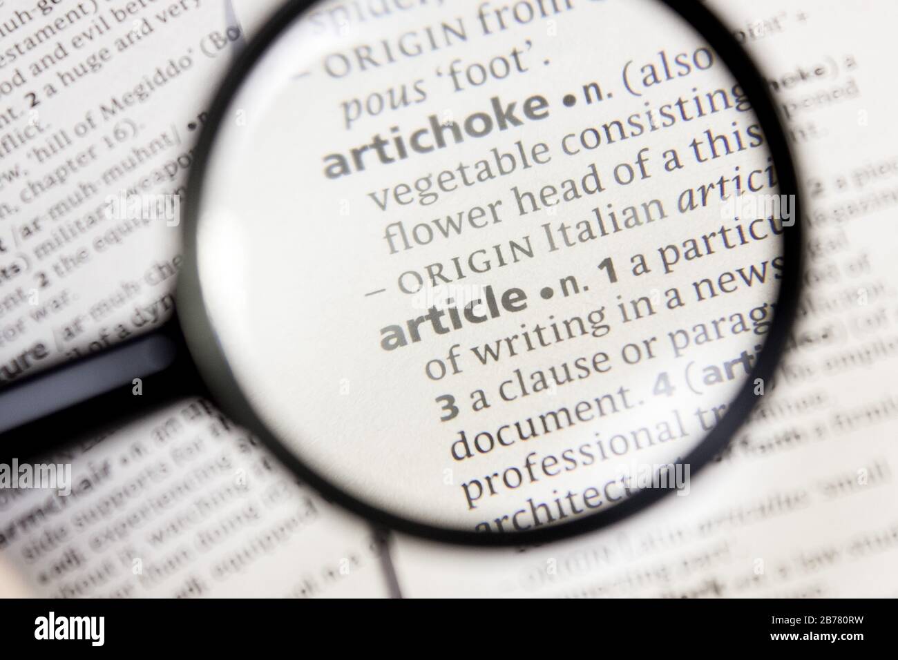 Article word or phrase in a dictionary Stock Photo - Alamy