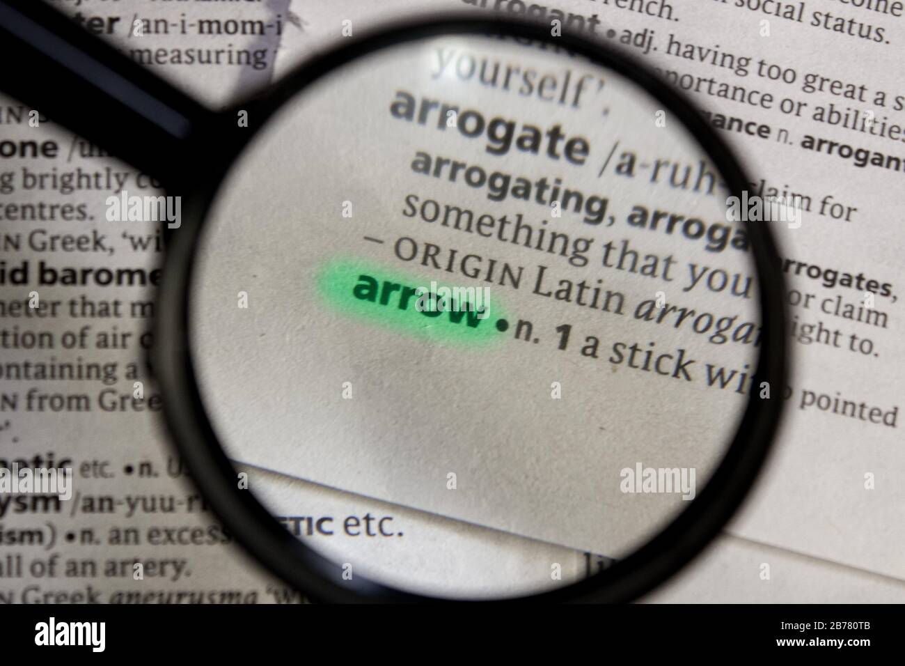 Arrow word or phrase in a dictionary Stock Photo - Alamy