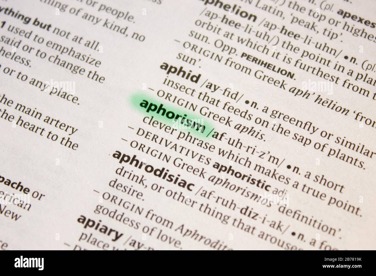 Aphorism word or phrase in a dictionary Stock Photo - Alamy