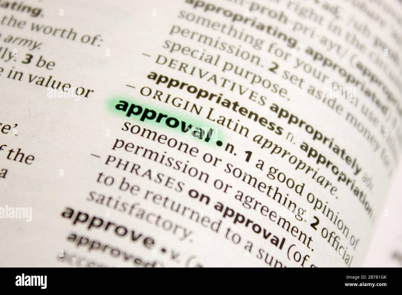 Approval word or phrase in a dictionary Stock Photo - Alamy