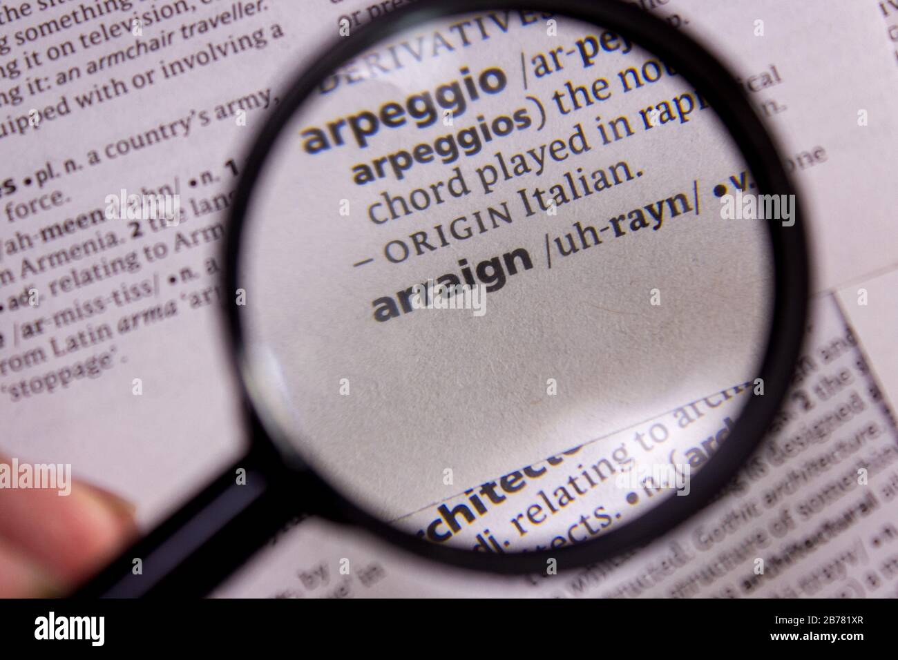 Arraign word or phrase in a dictionary Stock Photo - Alamy