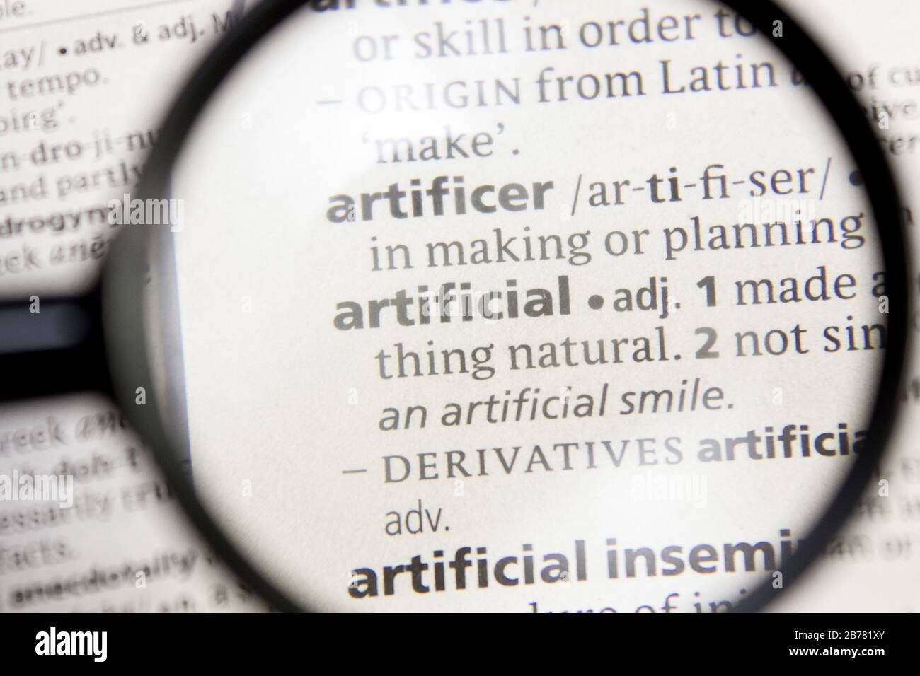 Artificial word or phrase in a dictionary Stock Photo - Alamy