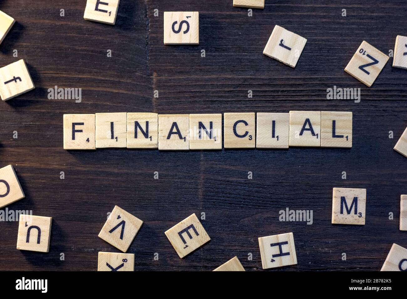 Scrabble board game financial hi-res stock photography and images - Alamy