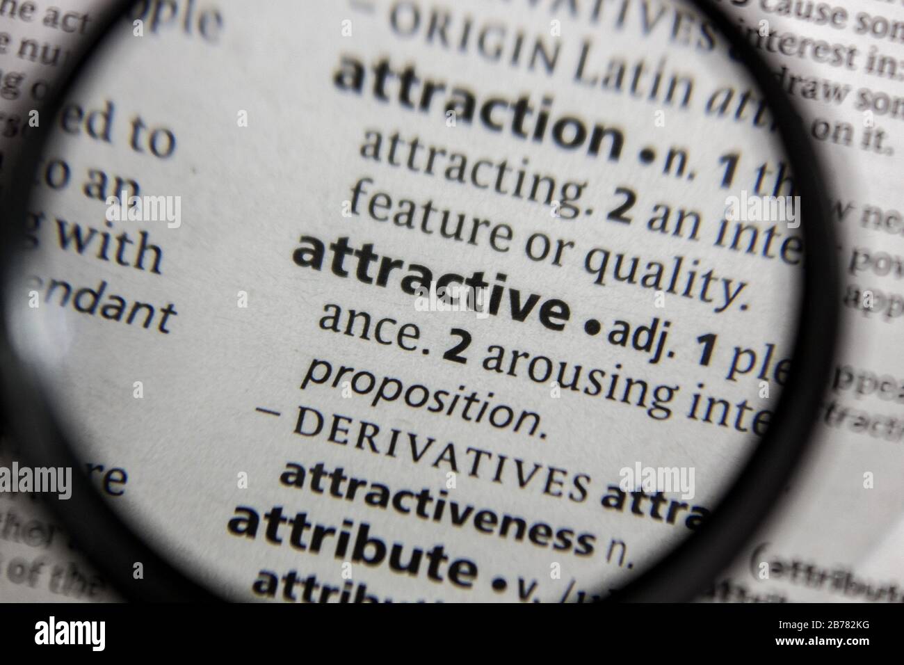The word or phrase attractive in a dictionary book Stock Photo - Alamy