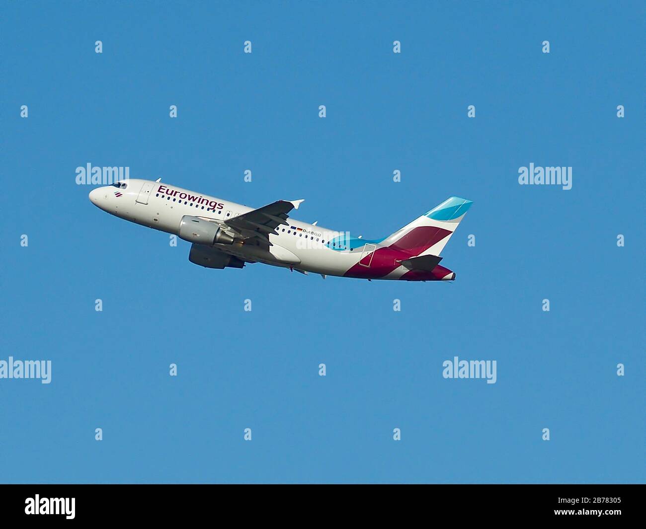 Flying Eurowings airplane in front of blue sky Stock Photo - Alamy