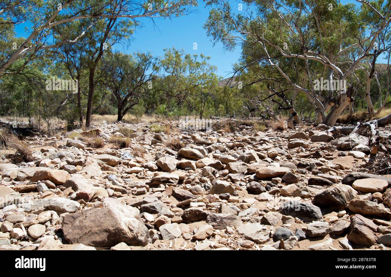 Alice Springs Australia, stone rubble in dry riverbed near Serpentine ...