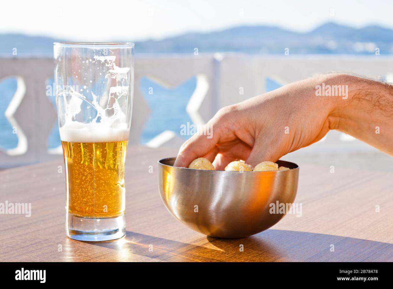 Hand picking snacks from hi-res stock photography and images - Alamy