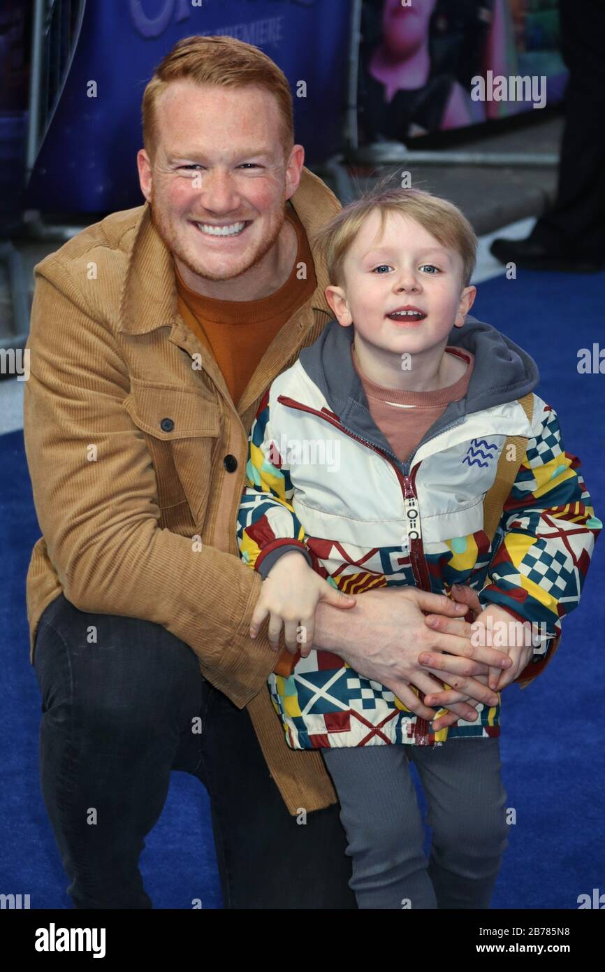 Greg Rutherford and son attending the Onward UK Premiere at the Curzon ...