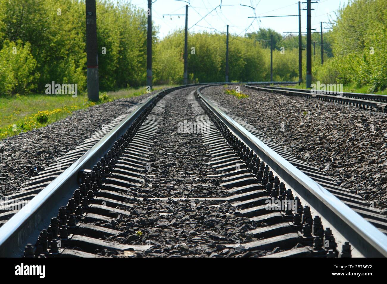 Rail lines on a green landscapes of Russia Stock Photo - Alamy