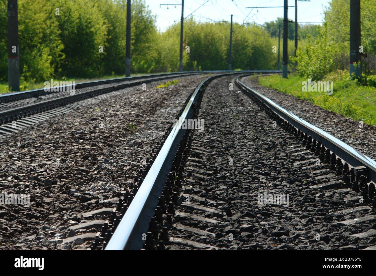 Rail lines on a green landscapes of Russia Stock Photo - Alamy