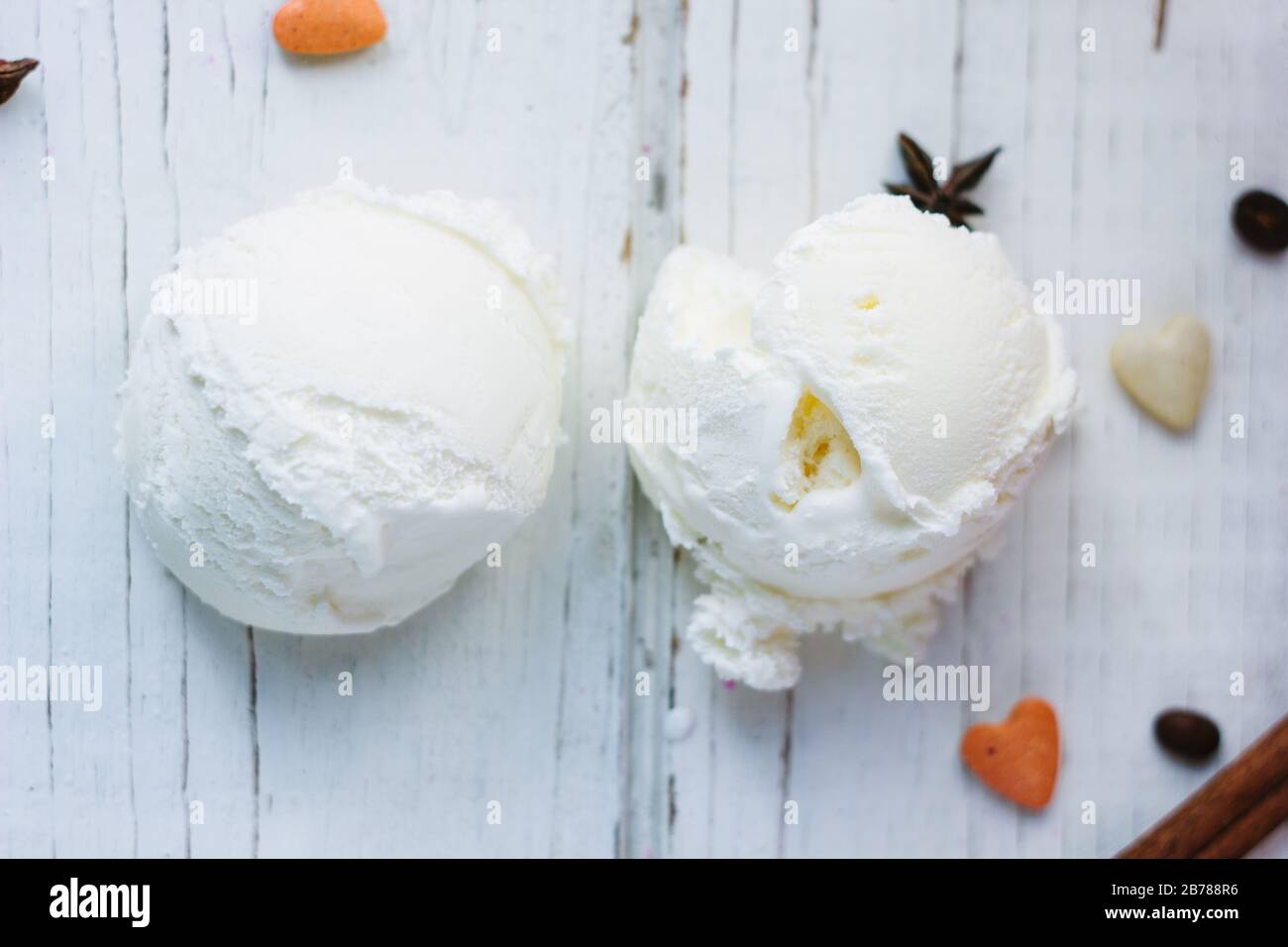Two balls of ice cream on white board Stock Photo - Alamy