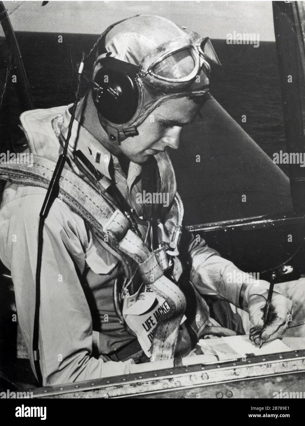 George H.W. Bush seated in a Grumman TBM Avenger, circa 1944 (H069-13 ...