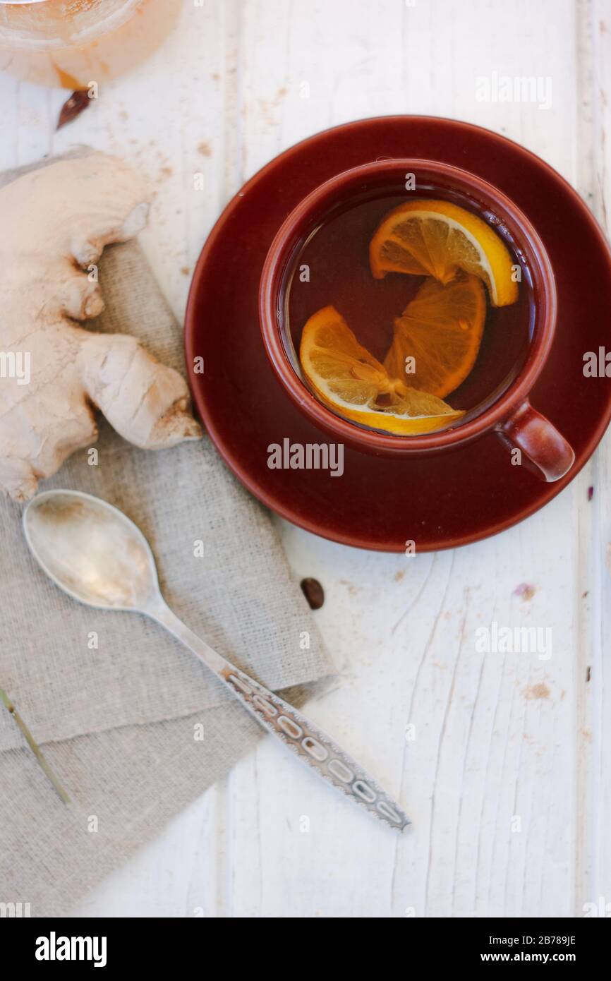 Ginger tea with lemon, lime and honey on white Stock Photo - Alamy