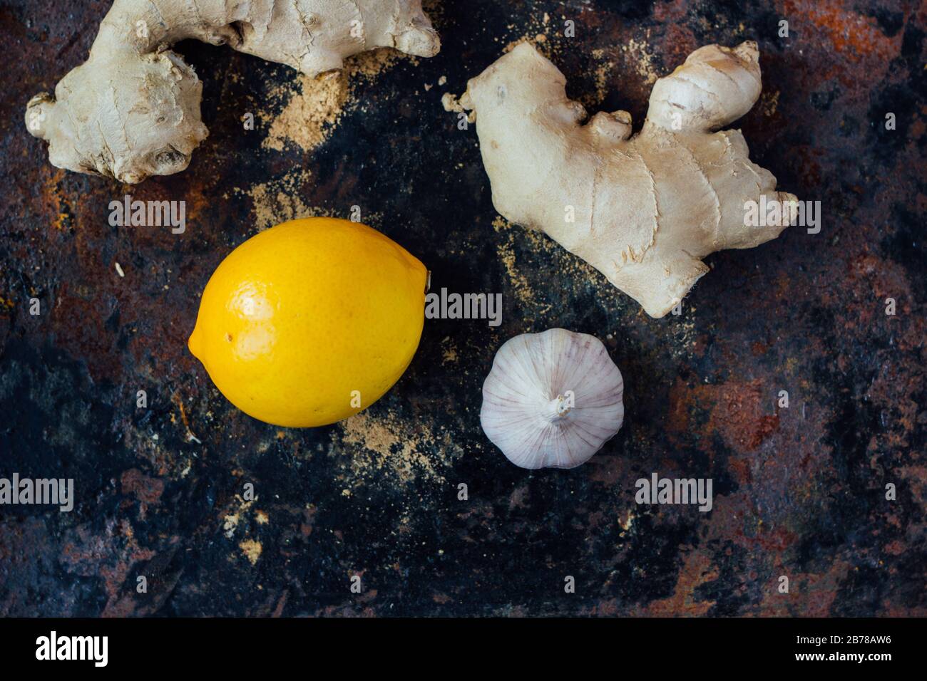 Citrus fruits with garlic and ginger root Stock Photo - Alamy
