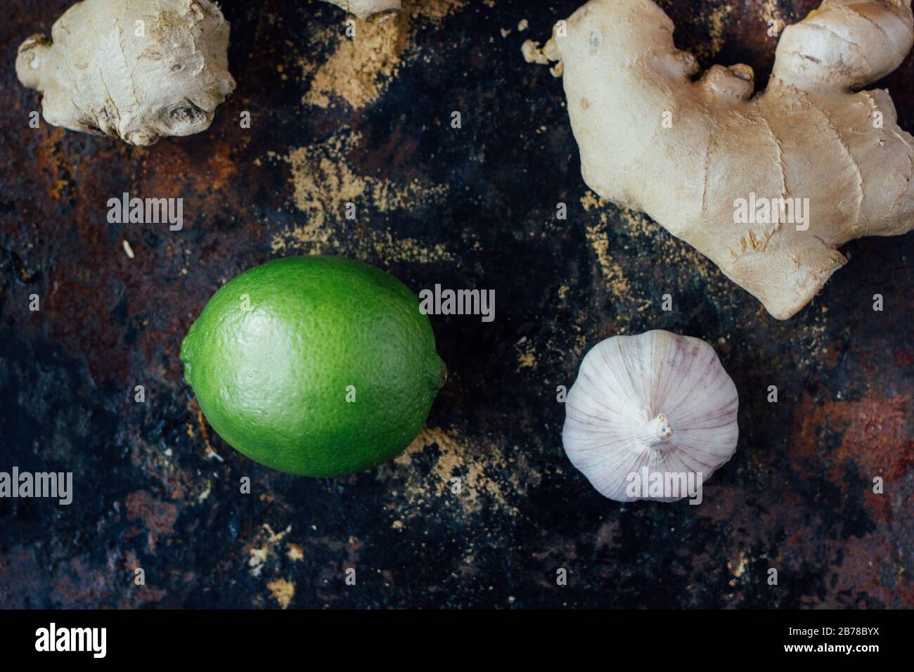 Citrus fruits with garlic and ginger root Stock Photo - Alamy