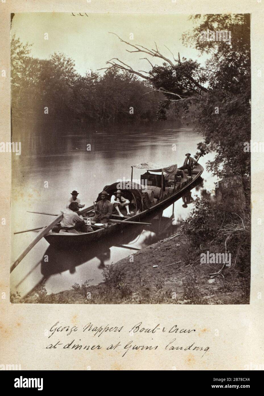 George Napper's boat & crew at dinner at Gwins landing Stock Photo - Alamy