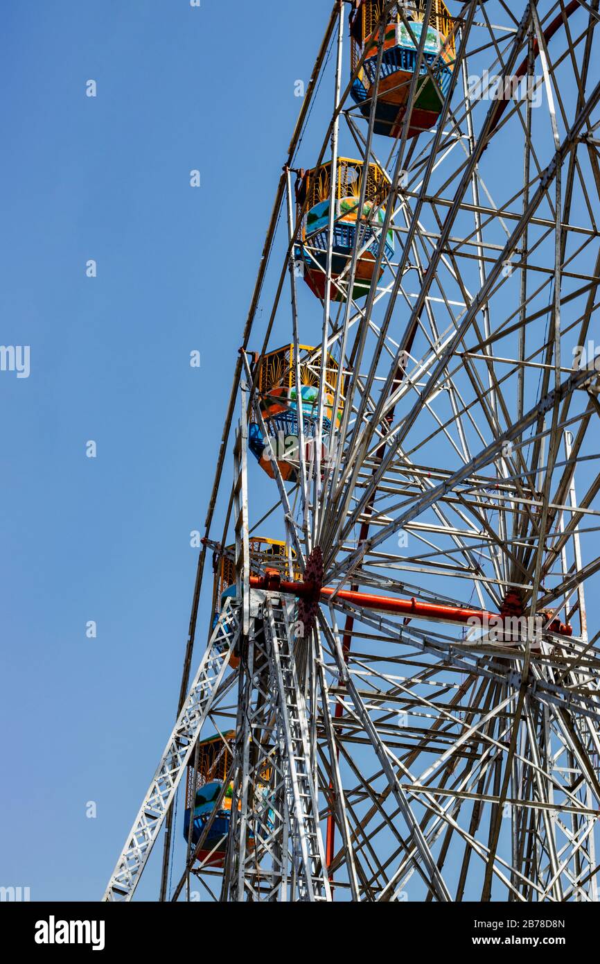 Ferris wheel in amusement park Stock Photo - Alamy