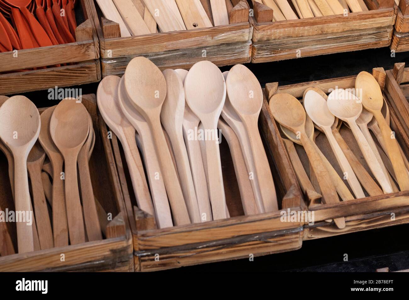 Wooden spoons and fork. Close-up. Light brown color Stock Photo - Alamy