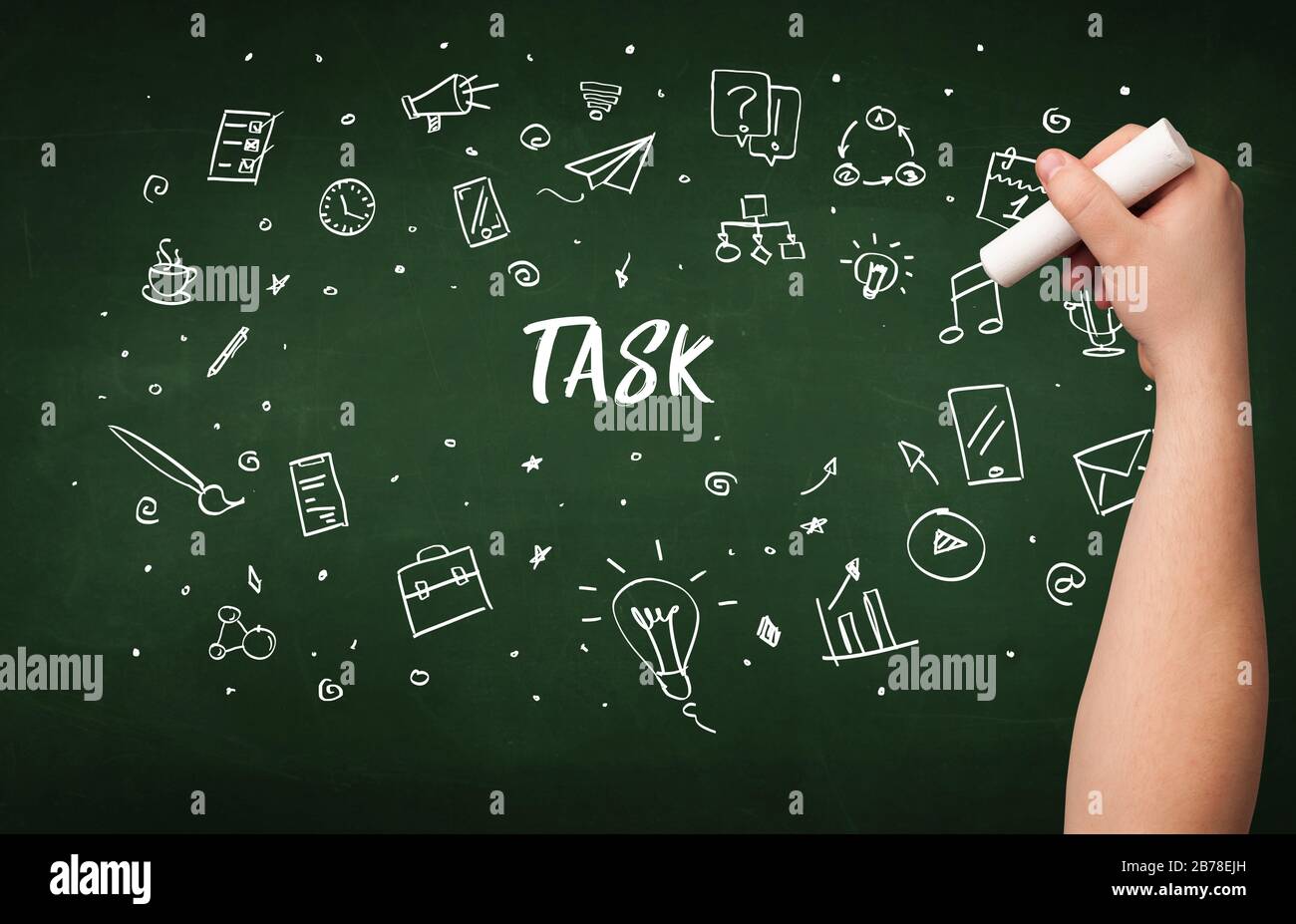 Hand drawing TASK inscription with white chalk on blackboard, education ...
