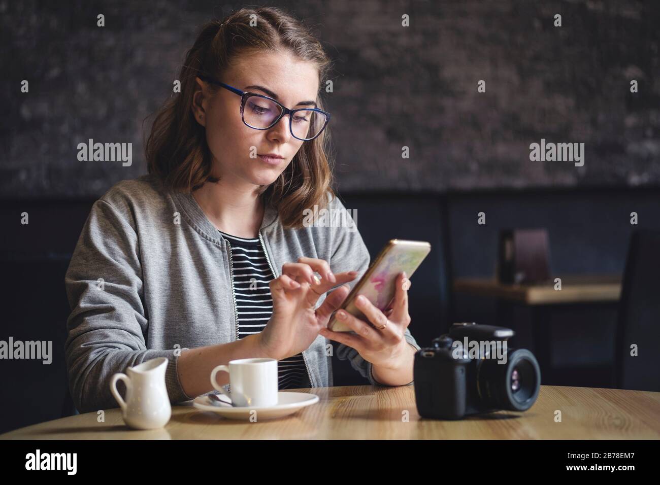 Woman browsing on mobile phone hi-res stock photography and images - Alamy