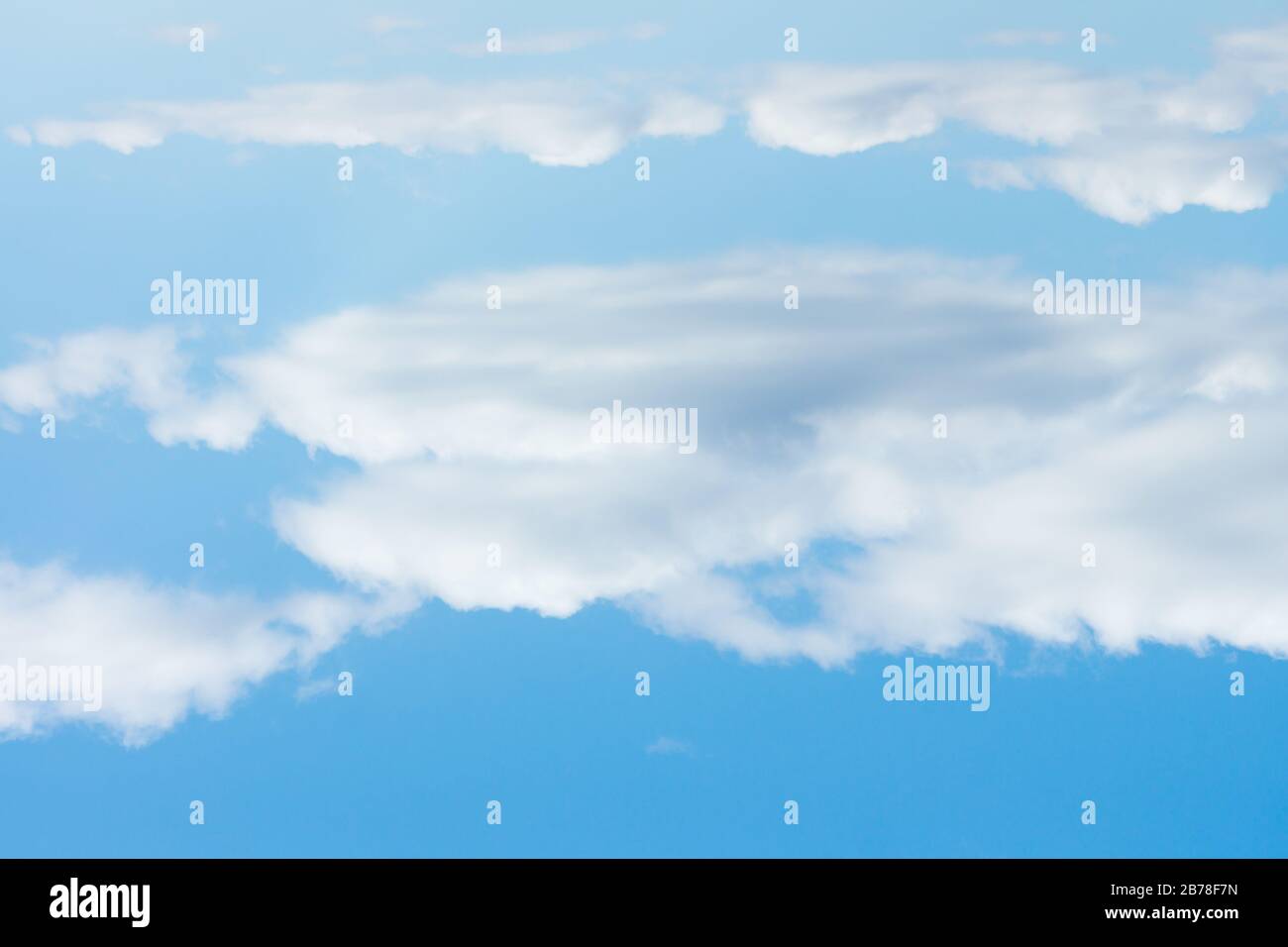 blue sky with flying white light clouds Stock Photo - Alamy