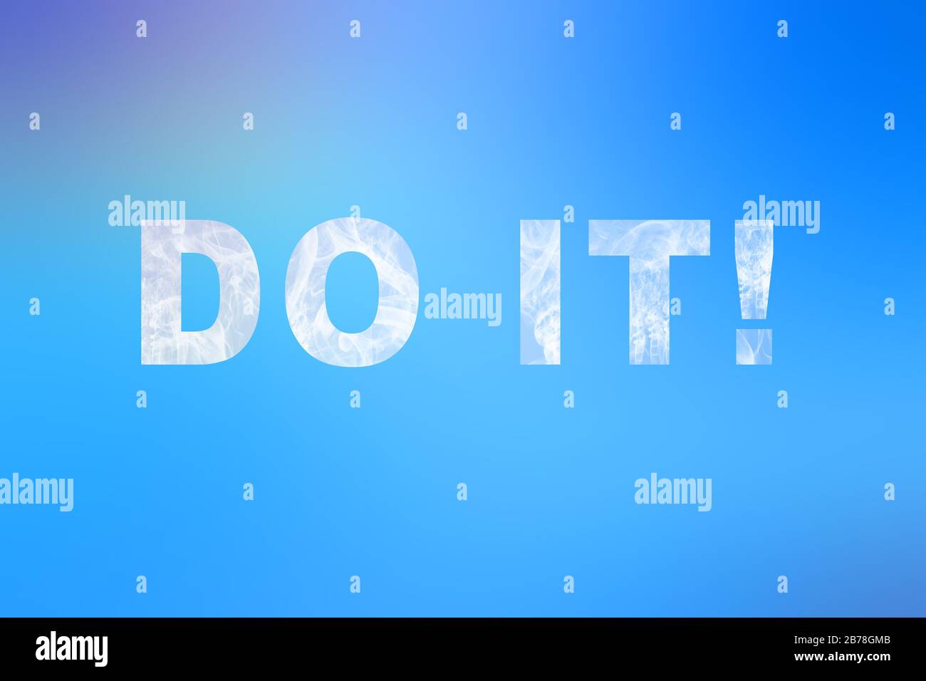 Do it words white letters made out of ccluffy clouds on blue sky nature ...