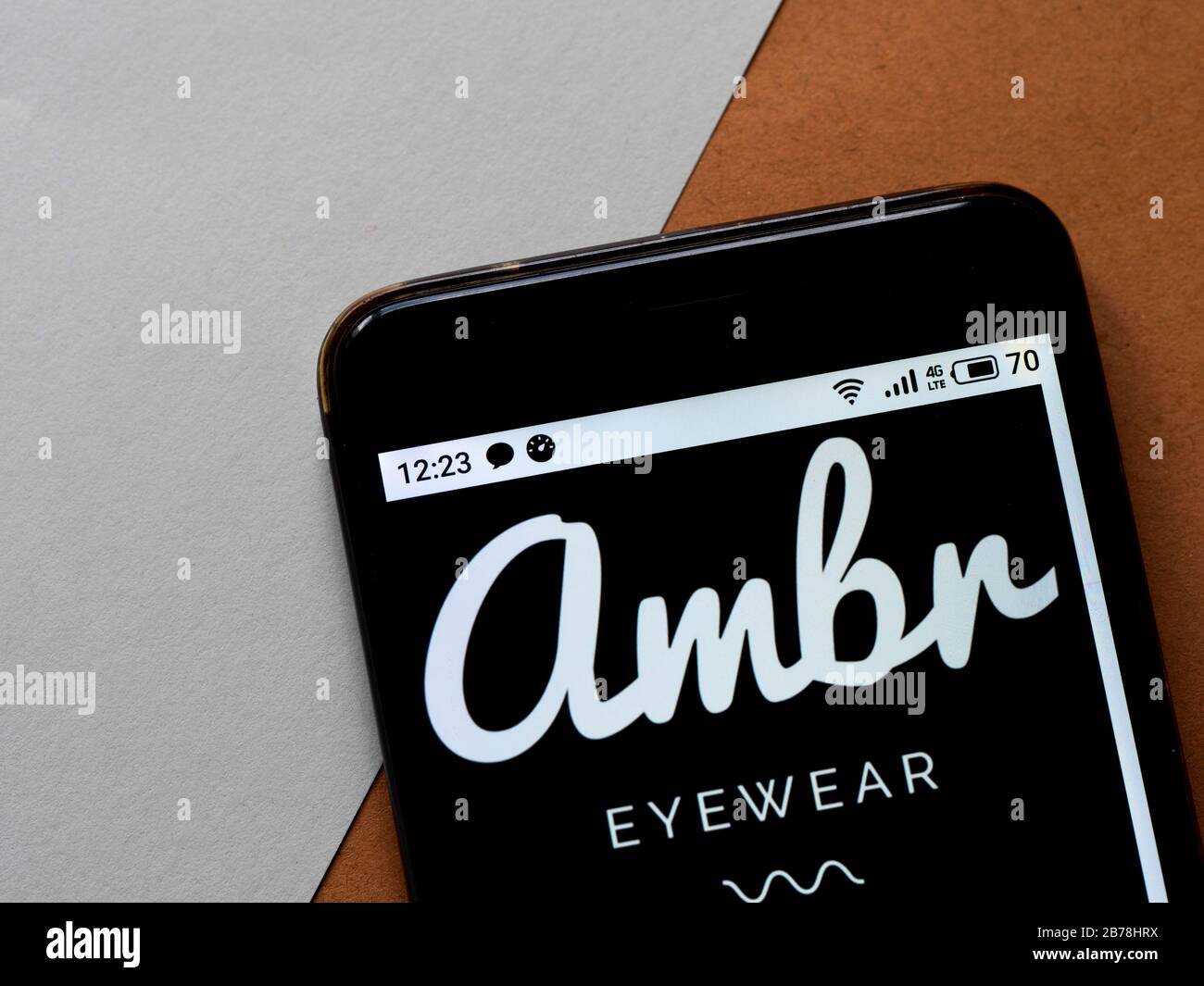 In this photo illustration the Ambr Eyewear logo seen displayed on a ...