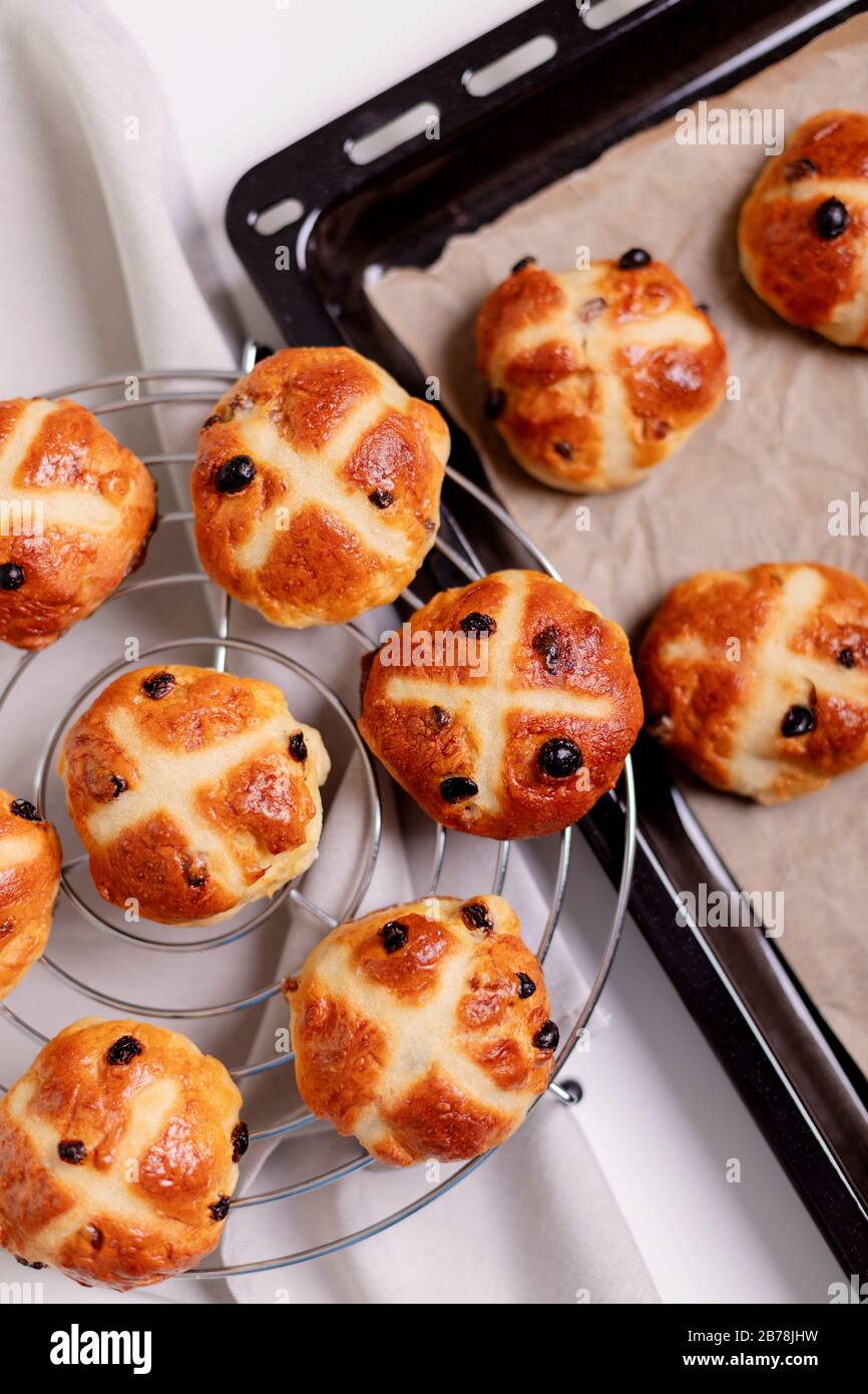 Buns marked with a cross and containing dried fruit, traditionally ...
