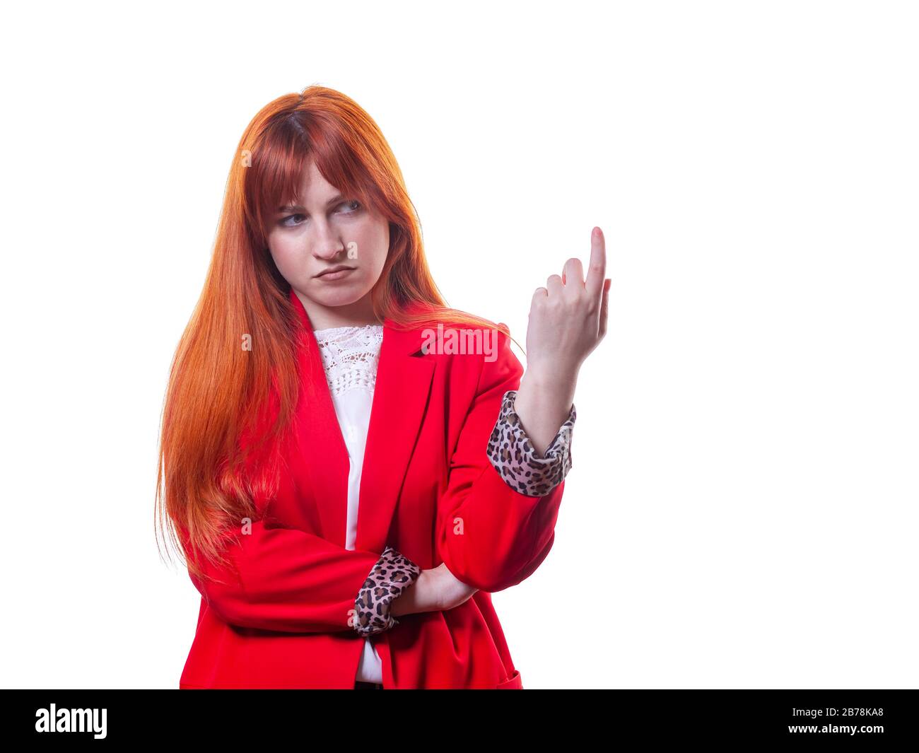 Pretty, confused business woman in red jacket pointing up a finger and ...