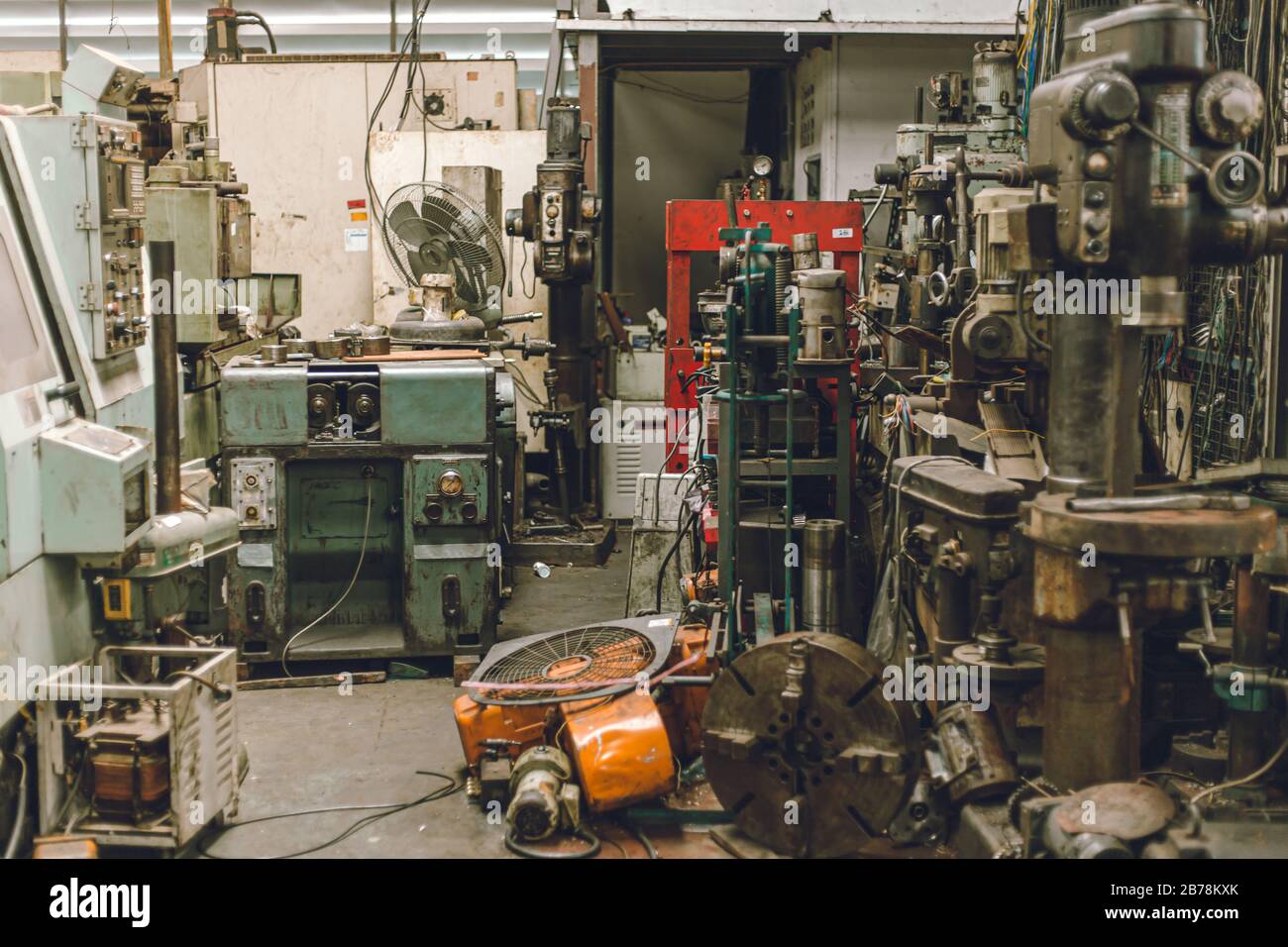 old grunge used machinery workshop garage or heavy machine junkyard ...