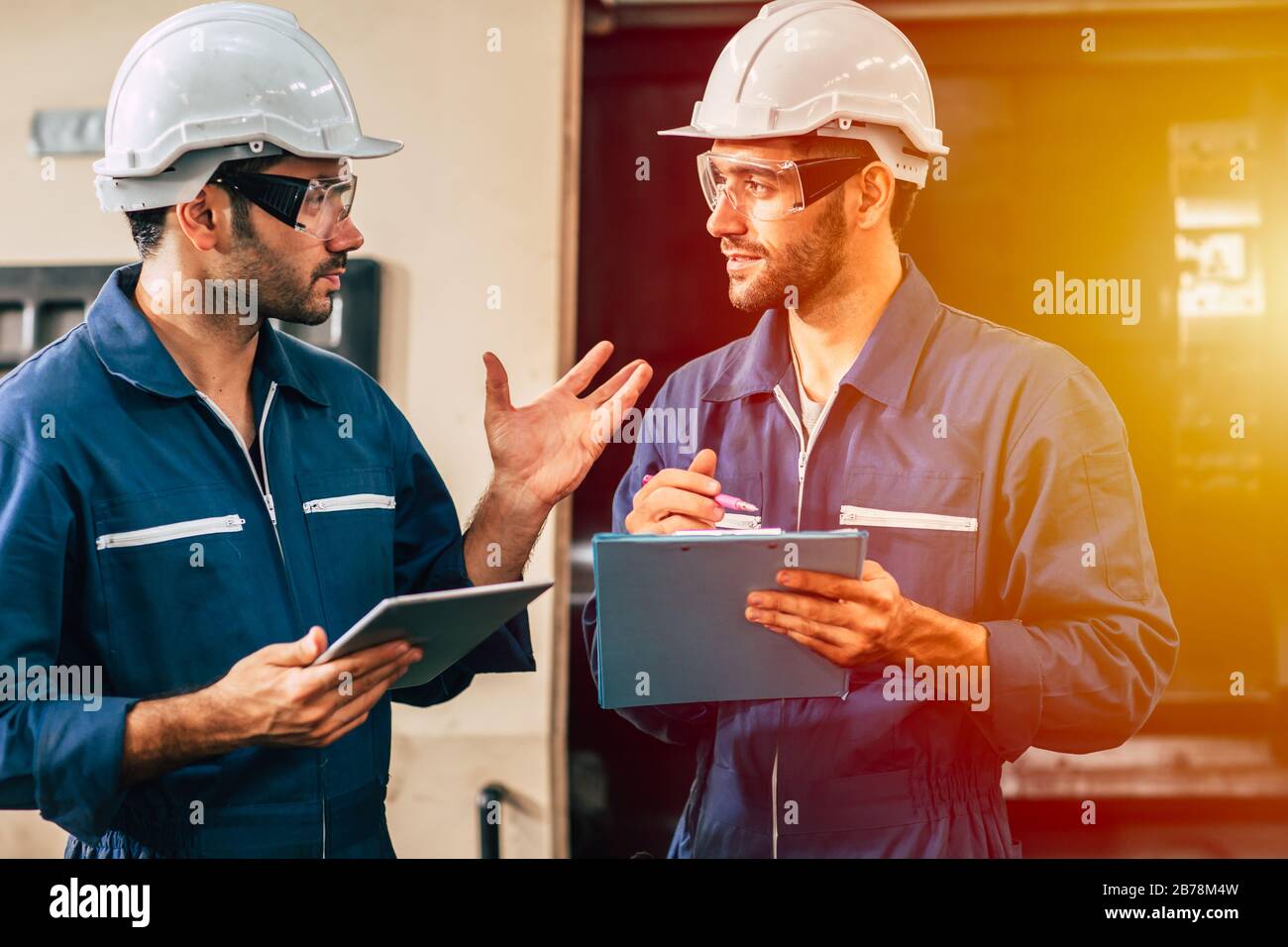 supervisor engineering team working together in heavy industry, check ...