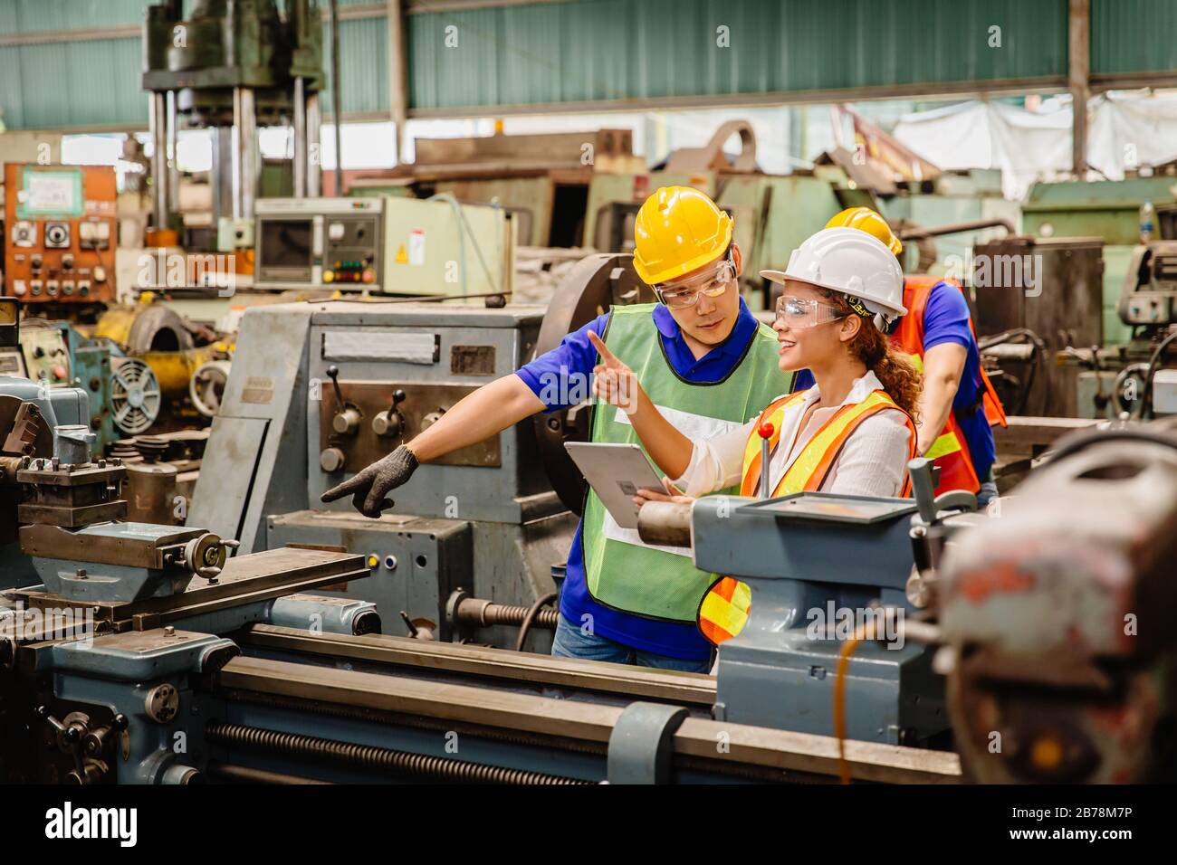 Mix race worker working together help each other to work in heavy ...