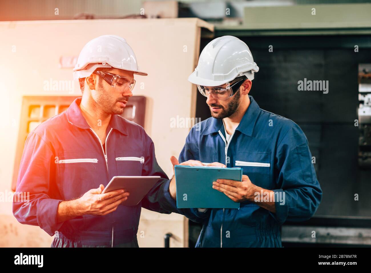 supervisor engineering team working together in heavy industry, check ...