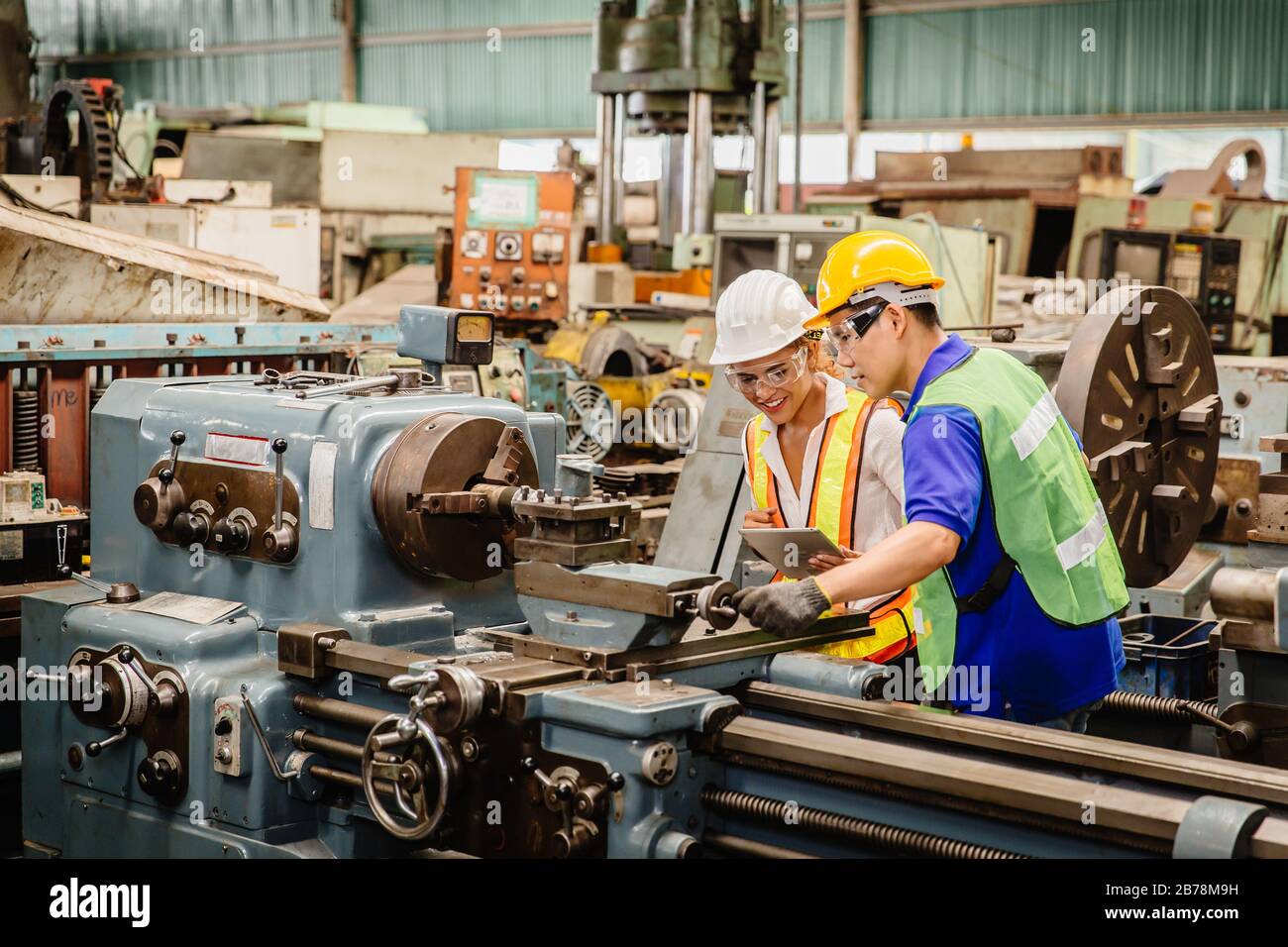 Mix race worker working together help each other to work in heavy ...