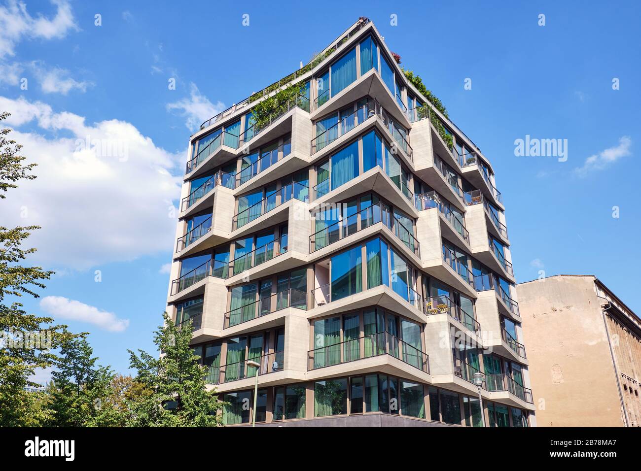 Apartment building with floor-to-ceiling windows seen in Berlin ...