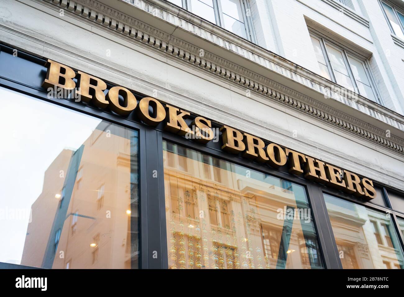American men's clothier chain Brooks Brothers store and logo Stock ...
