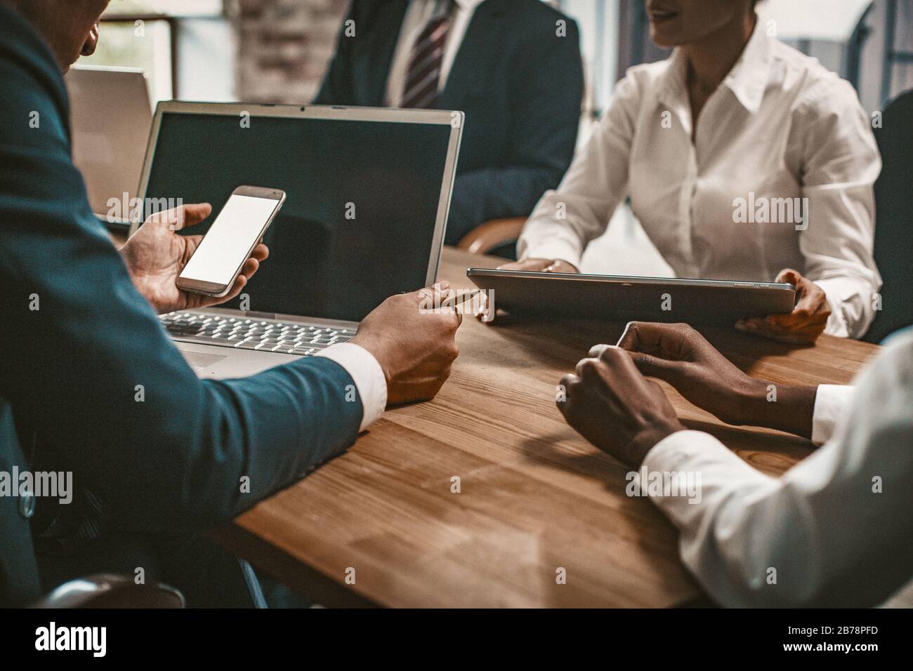 Teamwork of Multi Racial Business Partners during Metting Stock Photo ...