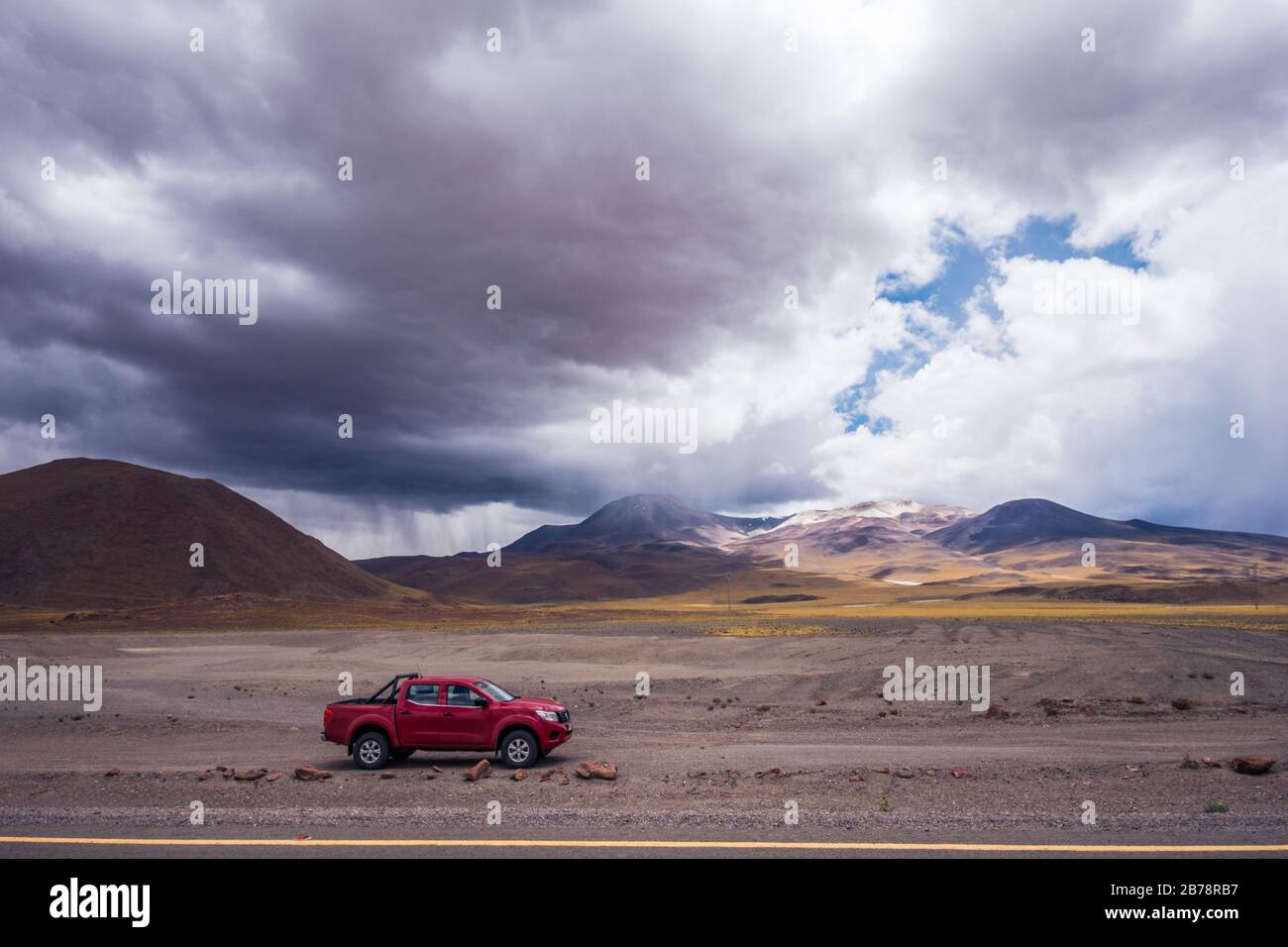 Red car behind beautiful scenic landscape Stock Photo - Alamy