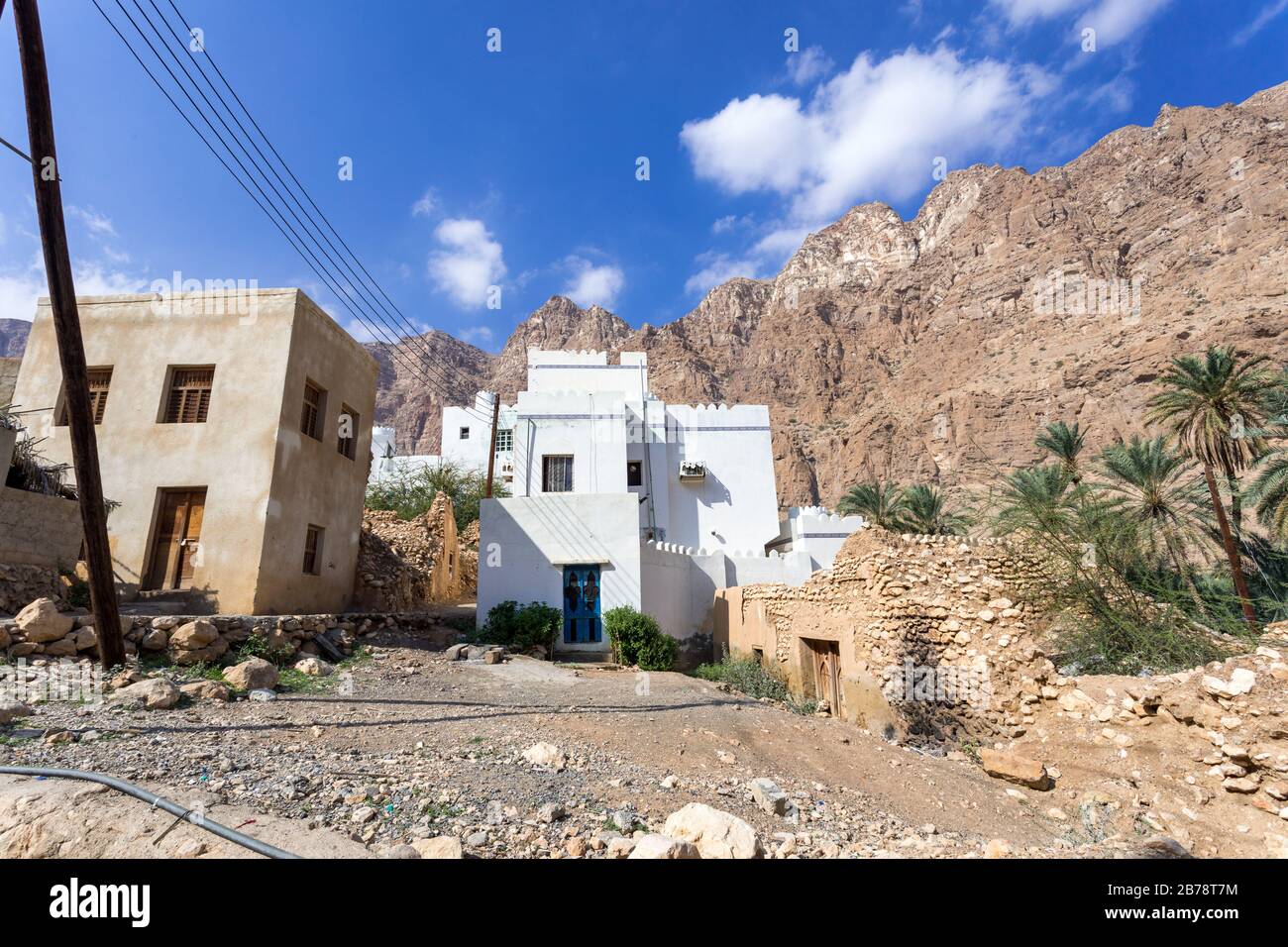 Typical Oman village surrounded by mountains at Wadi Tiwi - Oman Stock ...