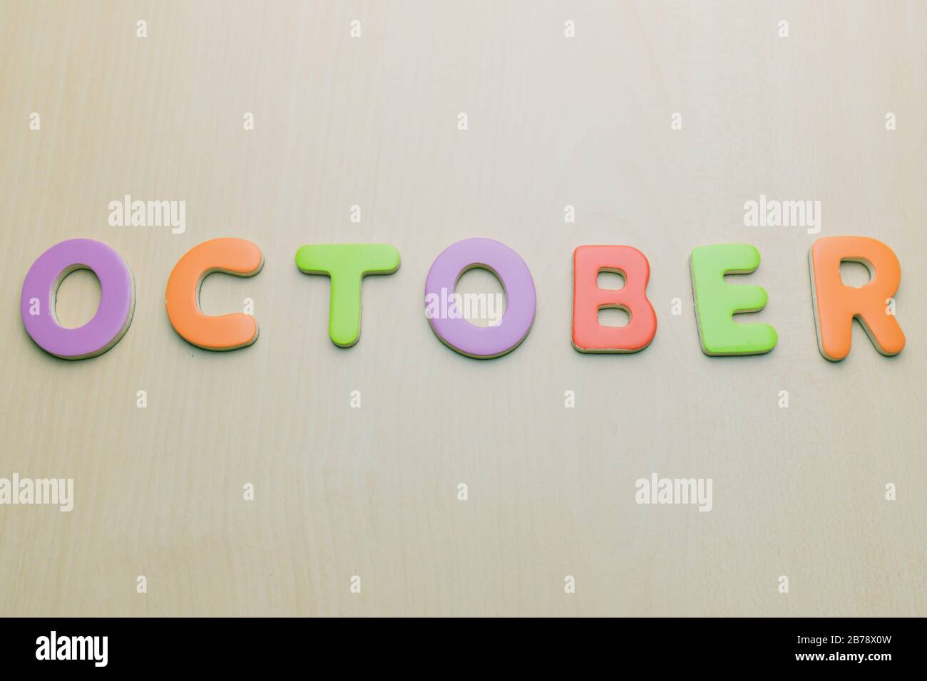 October month text written on hi-res stock photography and images - Alamy