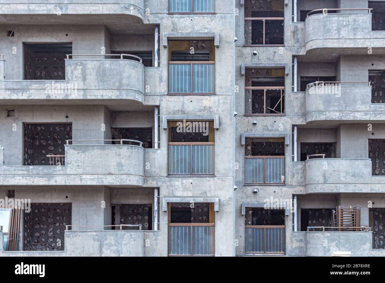 Derelict abandoned residential apartment building during demolition ...