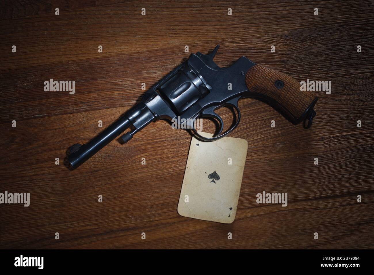 russian roulette - Ace of Spades plaing card and revolver with one ...