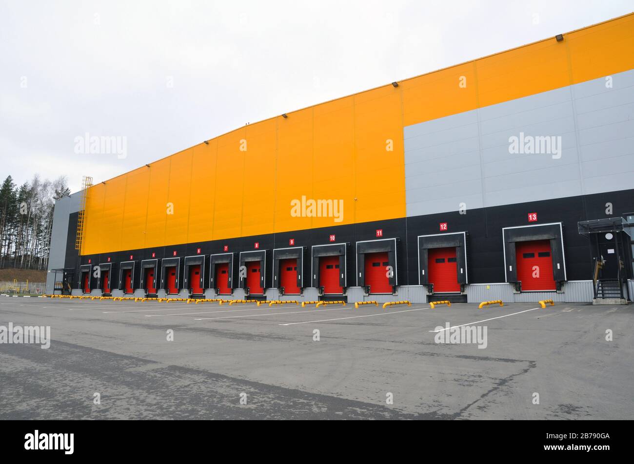 The building of a modern logistics center. Front view of loading docks ...