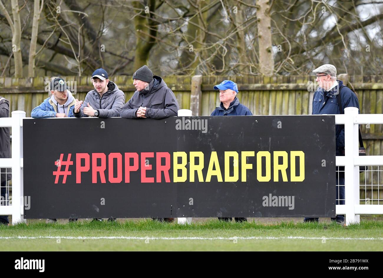 Fans behind a #Proper Bradford sign during the Vanarama National League ...