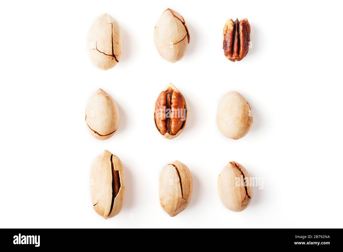 Set of peeled pecans in the center surrounded by nuts in the shell ...
