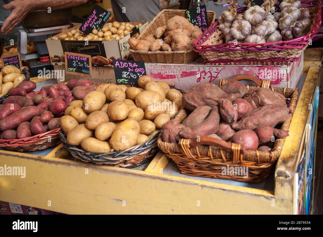 Different types of French potatoes for sale at the old Menton market ...
