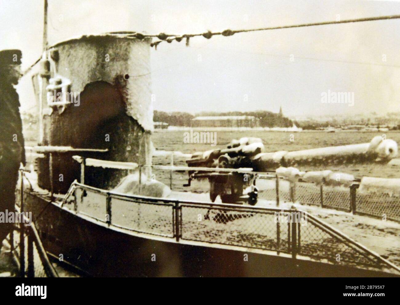 German U-Boat returns with ice on the guns after a patrol in the ...