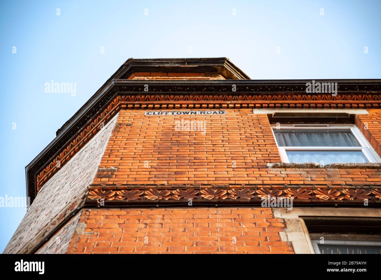 Close-up of a typical british residential brick house facade with ...