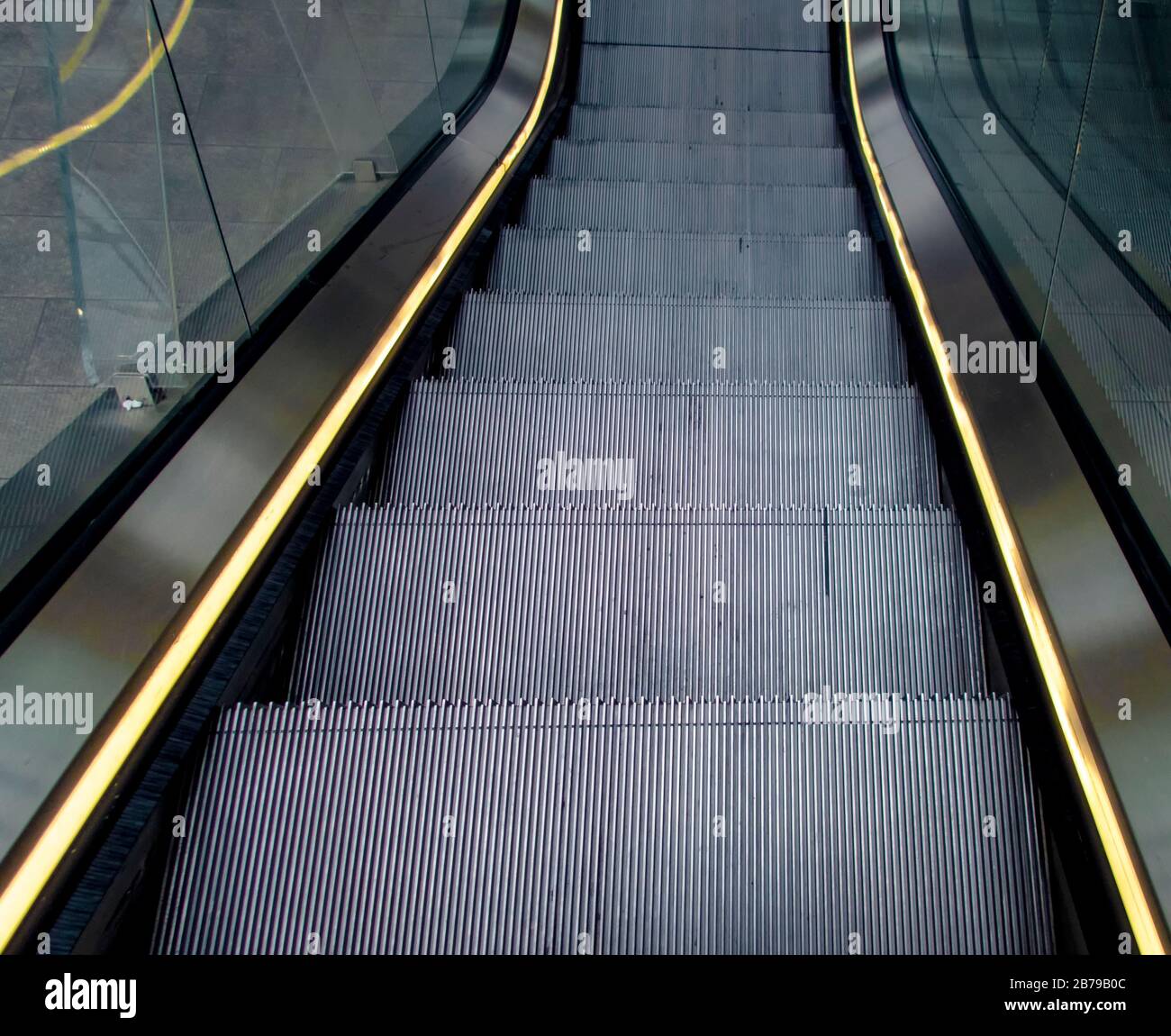 A modern escalator moving stairway Stock Photo - Alamy